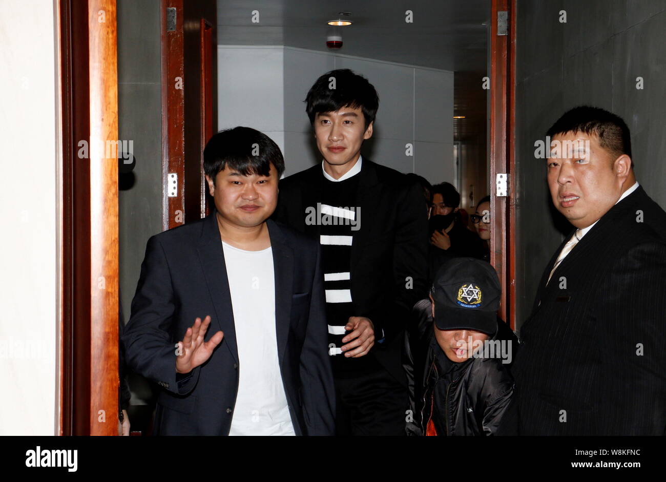 South Korean actor Lee Kwang-soo, center, arrives for the banquet for ...