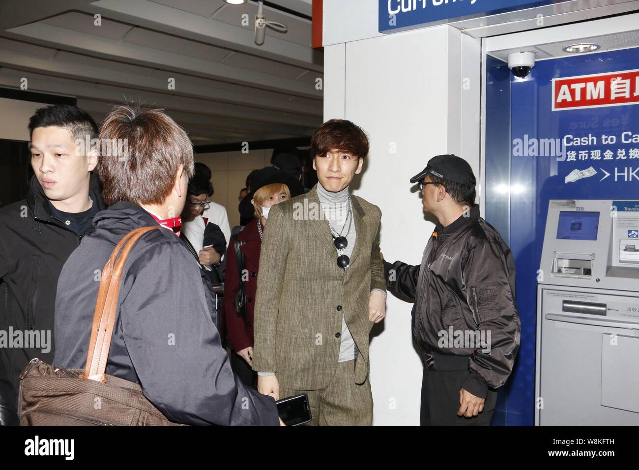 Members of Japanese boy band w-inds arrive at the Hong Kong ...