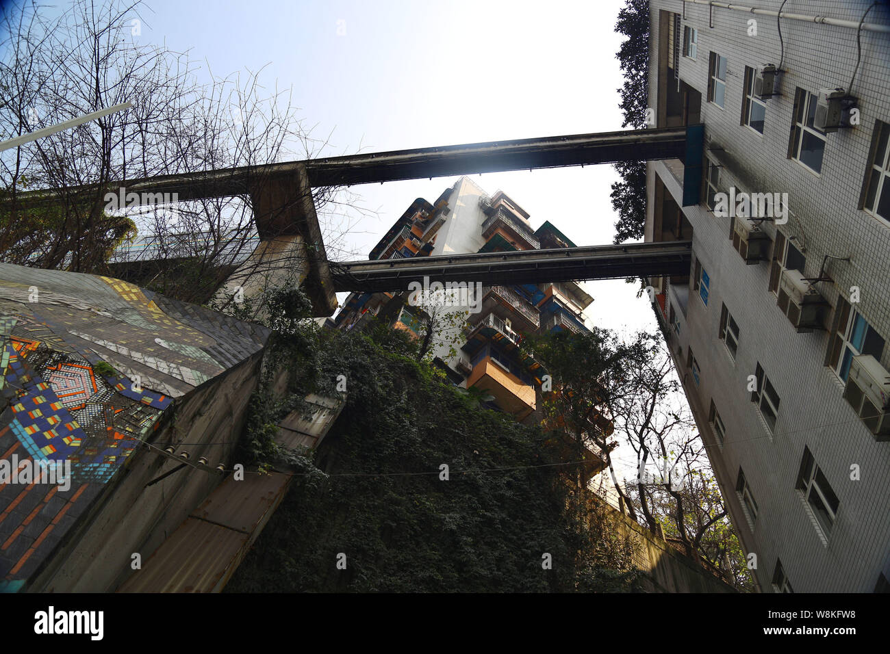 View of the monorails of Chongqing Light rail Line 2 through a building ...