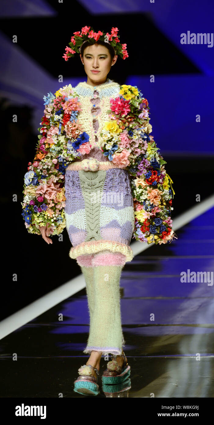 A model displays a new creation at Hempel Award - The 24th China ...