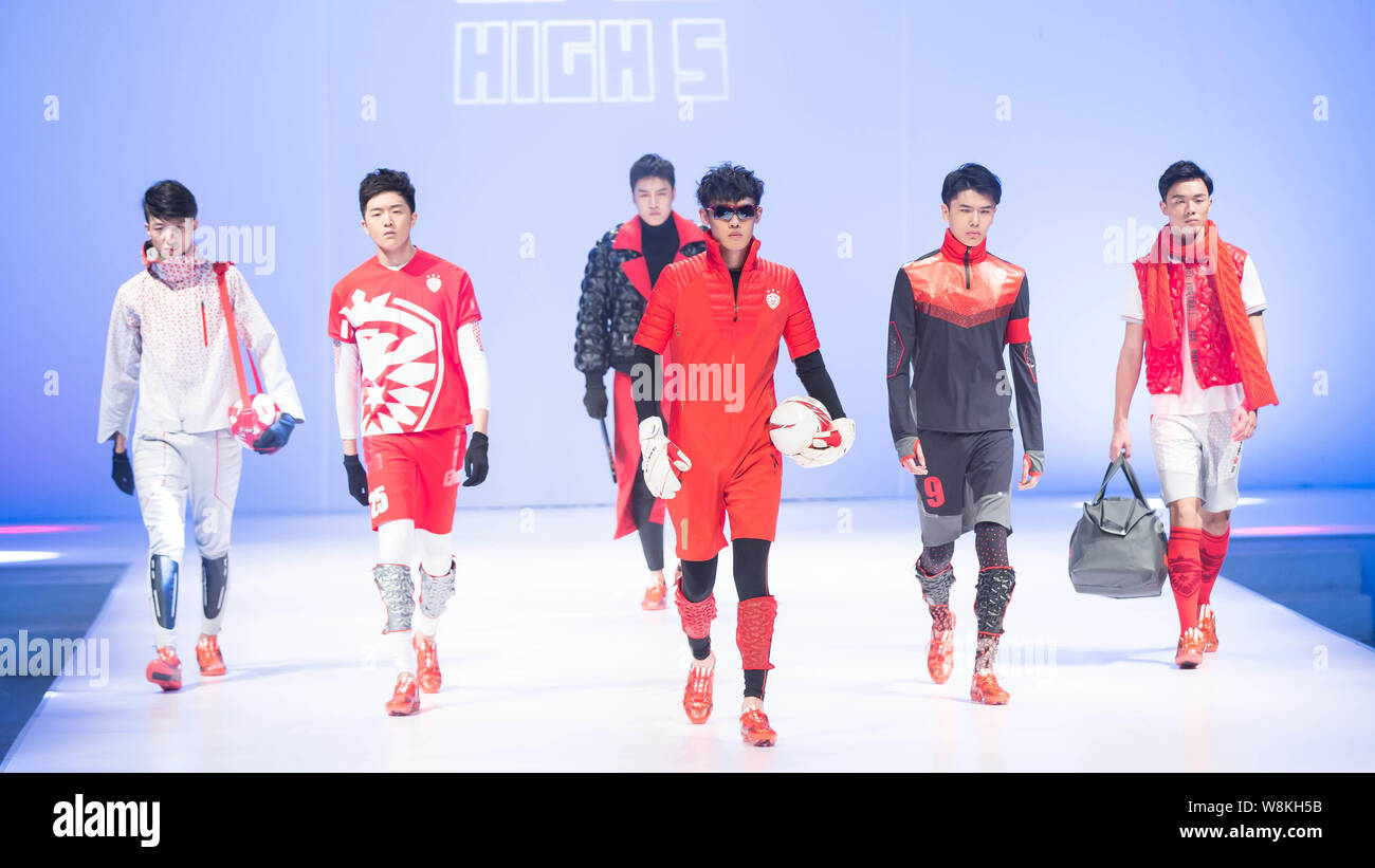 Models display new creations during a fashion show of sportswear ...