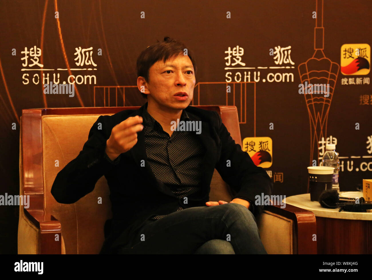 Charles Zhang Chaoyang, Chairman and CEO of Sohu, speaks at a ...