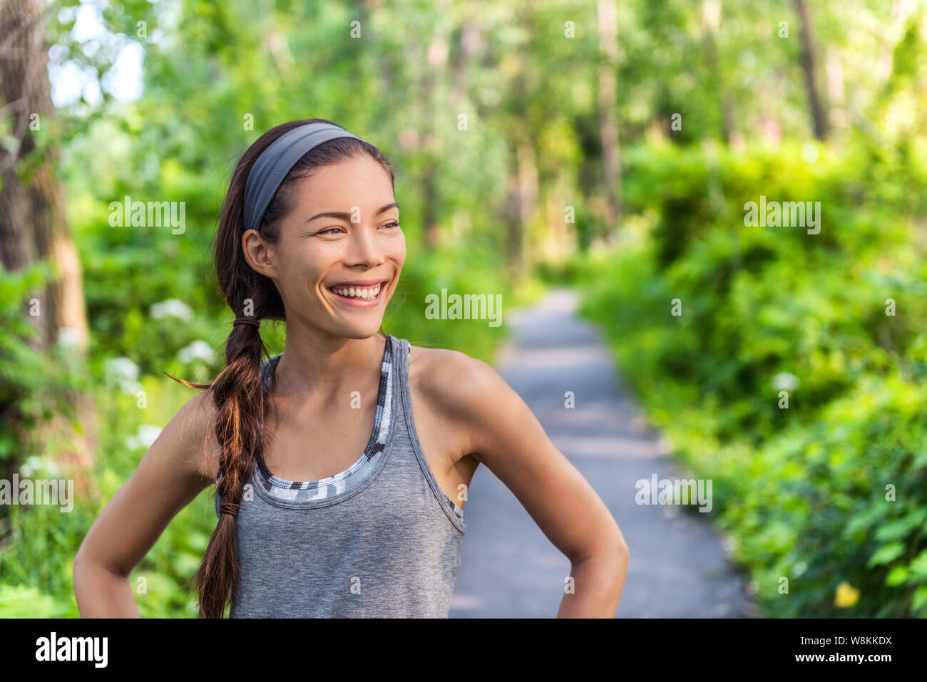 Asian girl jogging outdoor park hi-res stock photography and images - Alamy