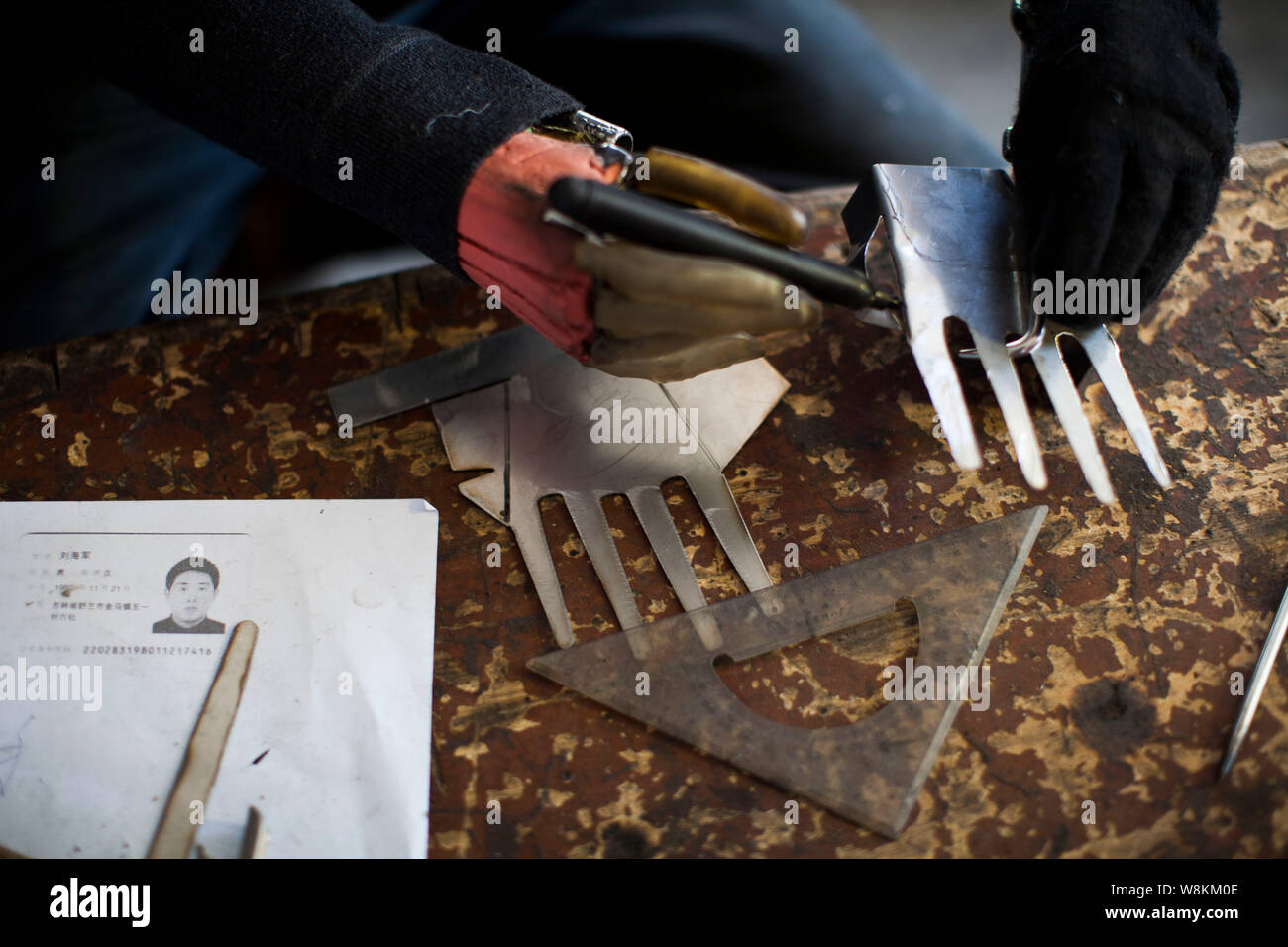 63-year-old armless farmer Sun Jifa who is equipped with his homemade ...