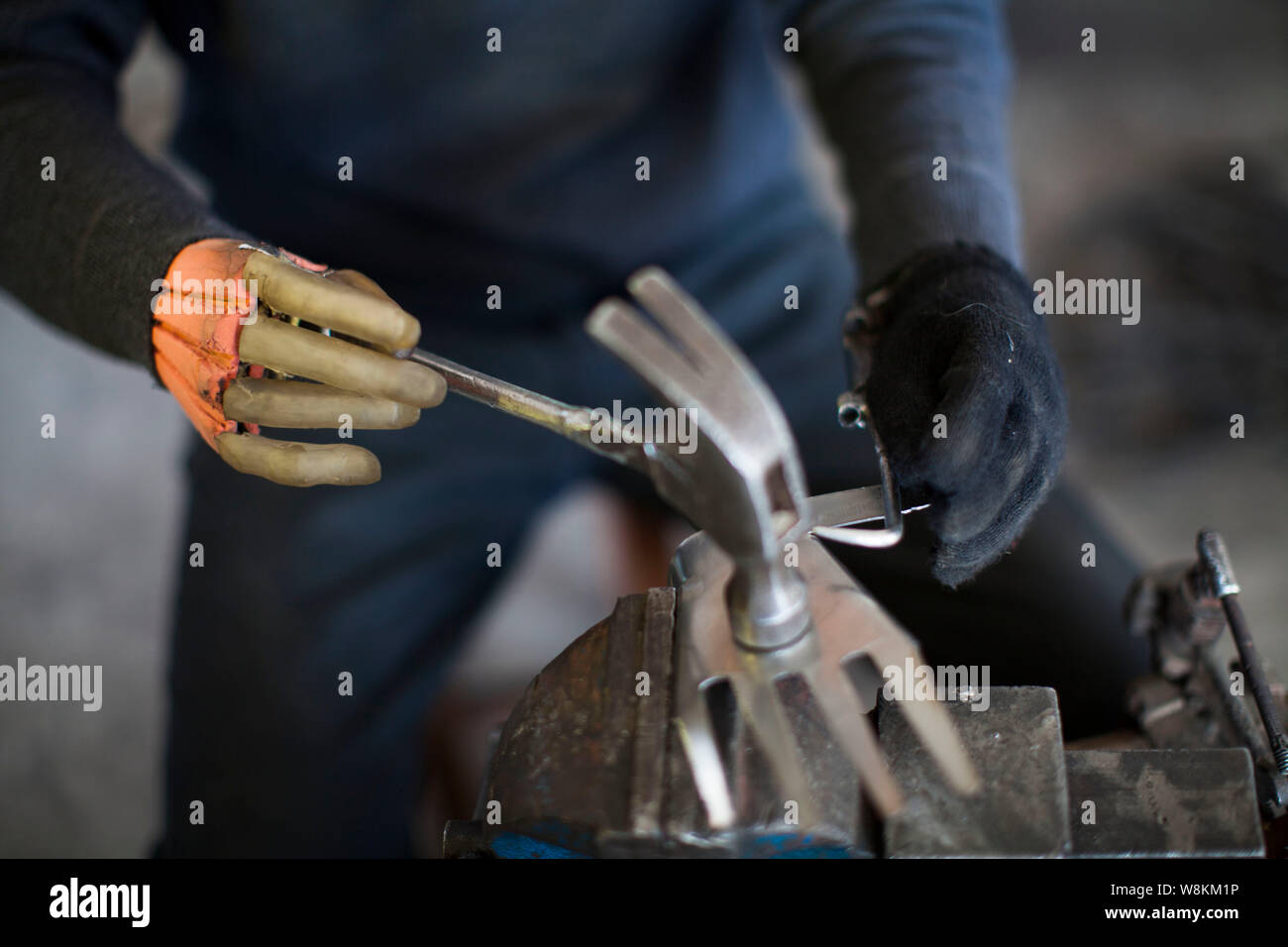 63-year-old armless farmer Sun Jifa who is equipped with his homemade ...