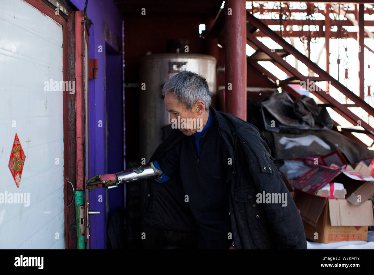 63-year-old armless farmer Sun Jifa who is equipped with his homemade ...