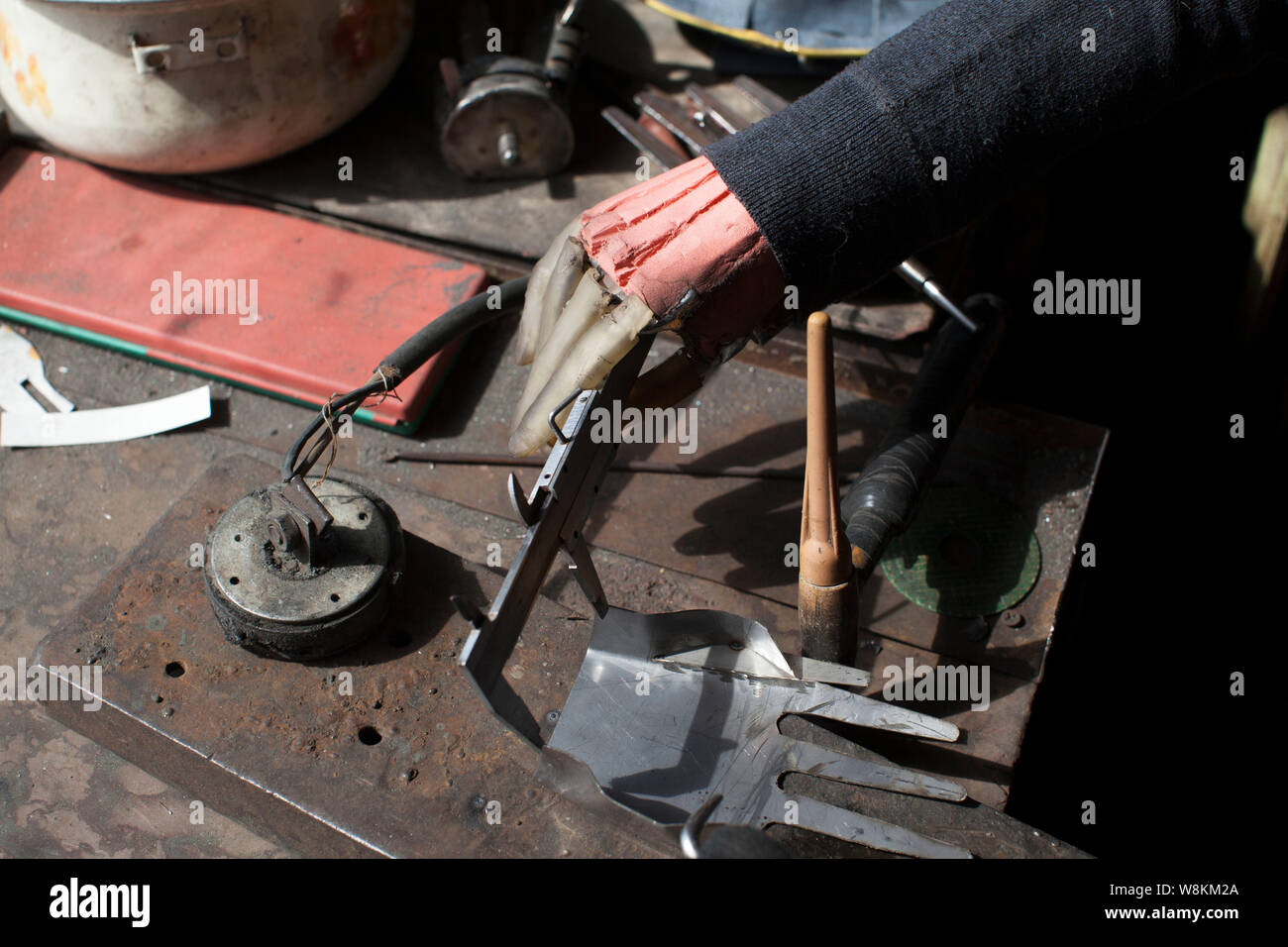 63-year-old armless farmer Sun Jifa who is equipped with his homemade ...