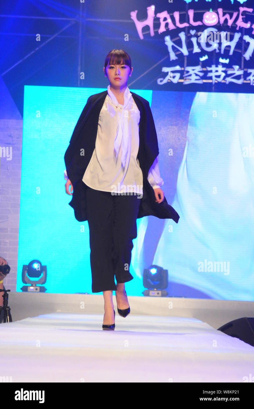 --FILE--Tang Anqi of Chinese idol girl group SNH48 parades during a ...