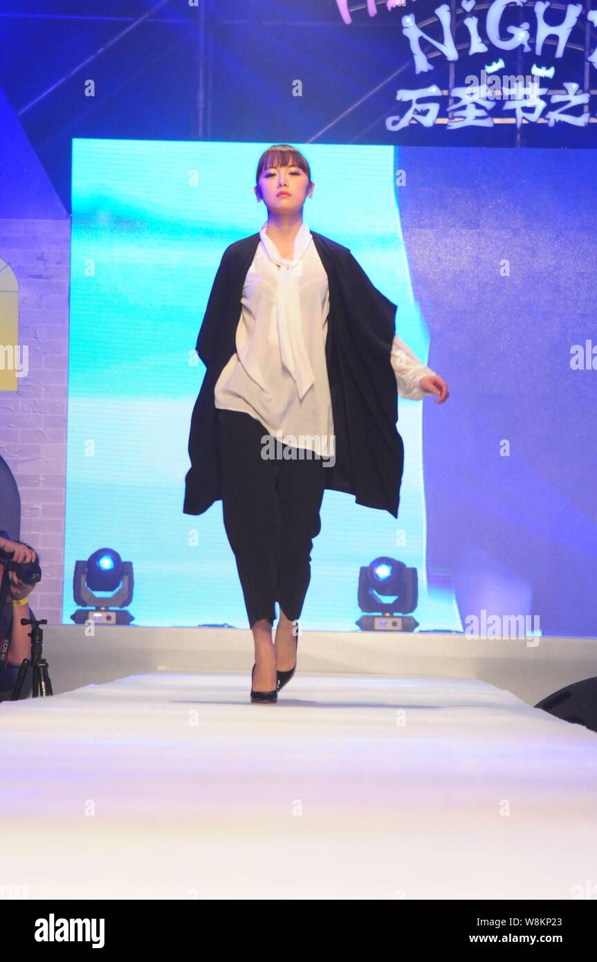 --FILE--Tang Anqi of Chinese idol girl group SNH48 parades during a ...