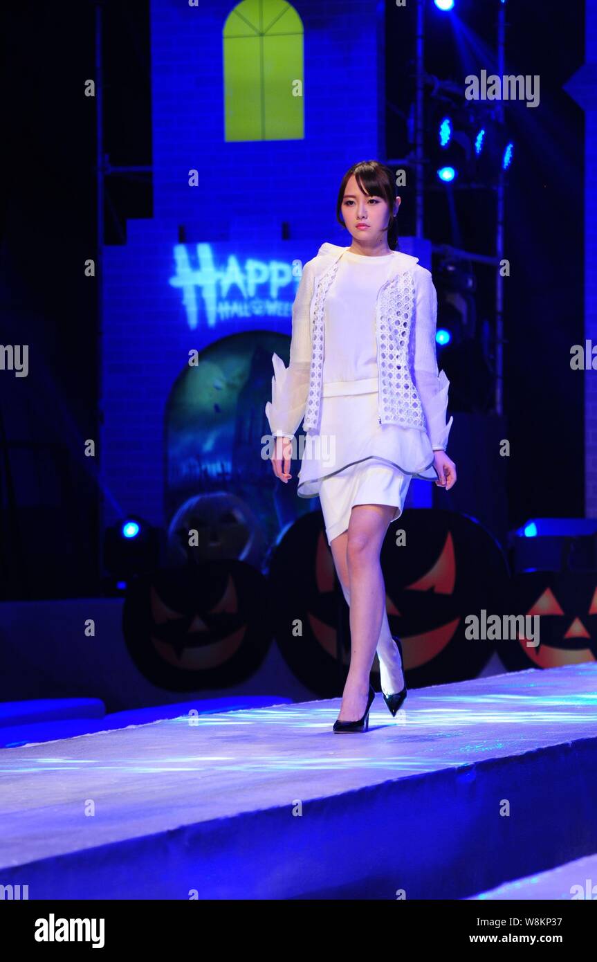 --FILE--Tang Anqi of Chinese idol girl group SNH48 parades during a ...