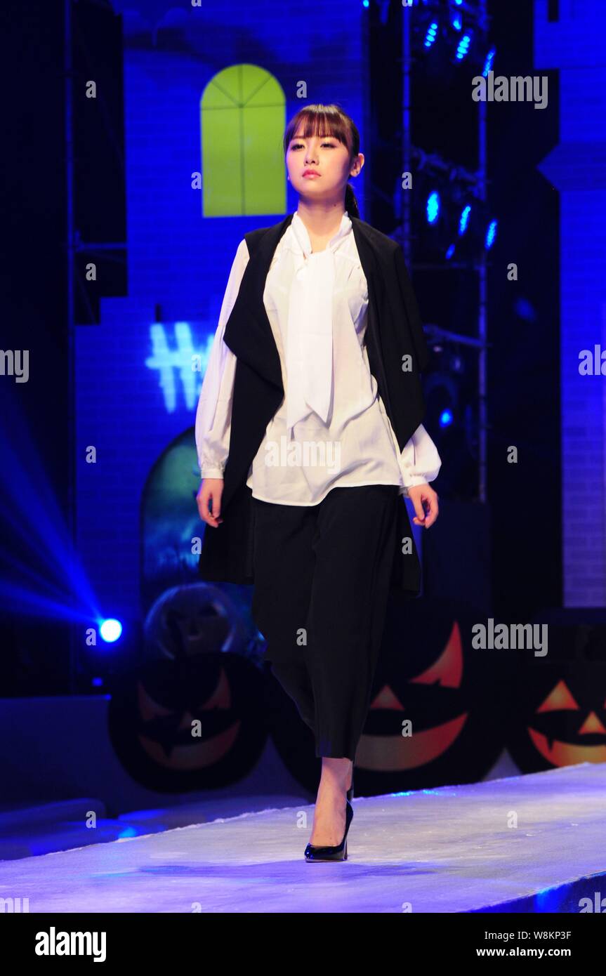 --FILE--Tang Anqi of Chinese idol girl group SNH48 parades during a ...