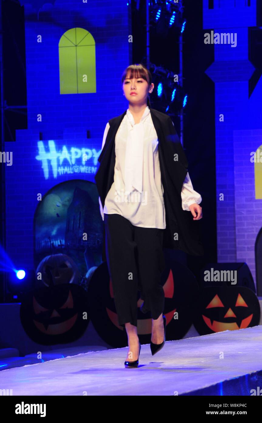 --FILE--Tang Anqi of Chinese idol girl group SNH48 parades during a ...