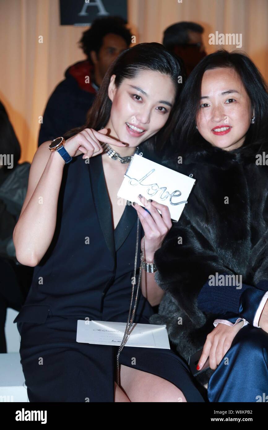 Chinese model Bonnie Chen Bige, left, attends the fashion show of ...