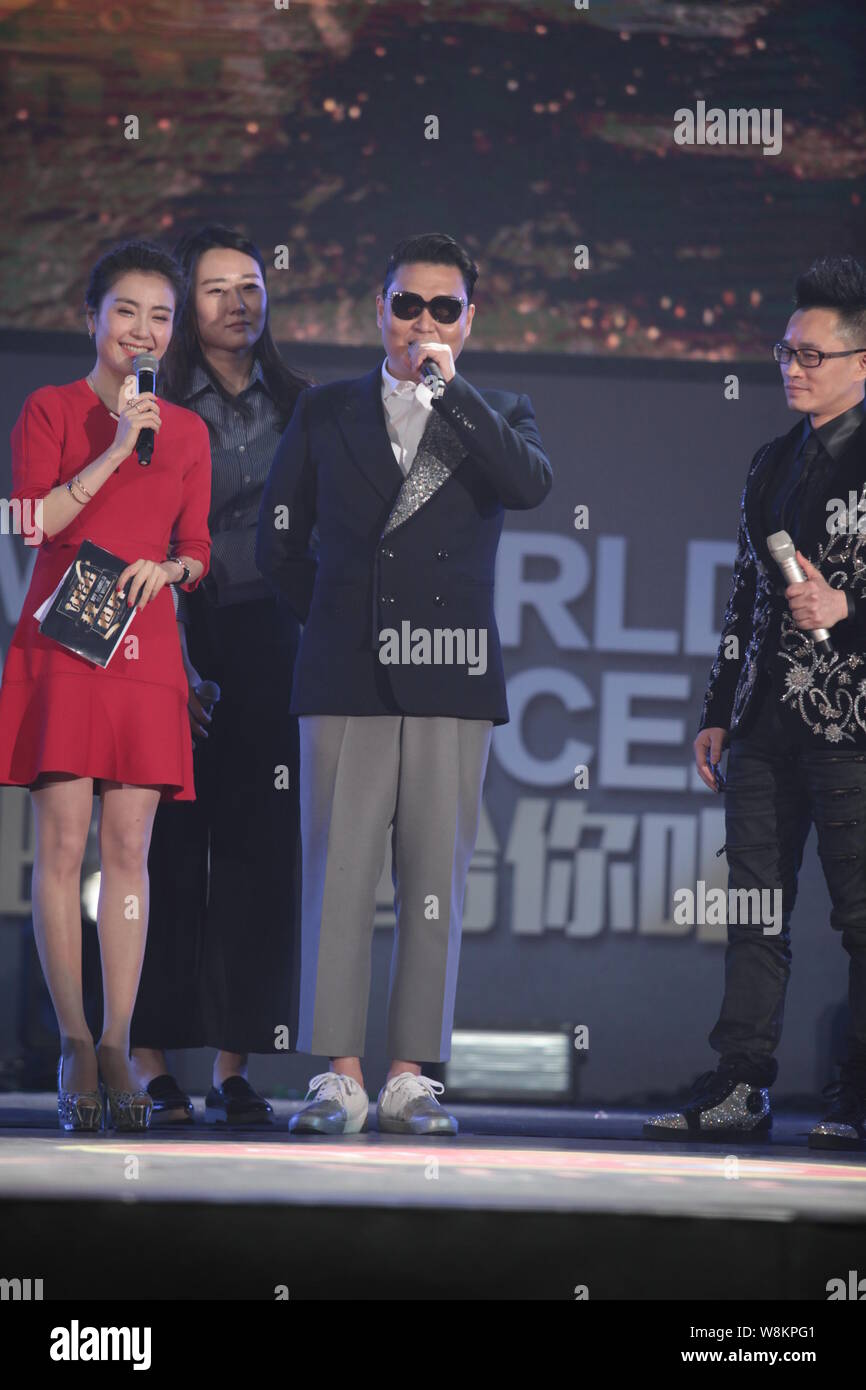 South Korean singer-songwriter Park Jae-sang, center, better known by ...