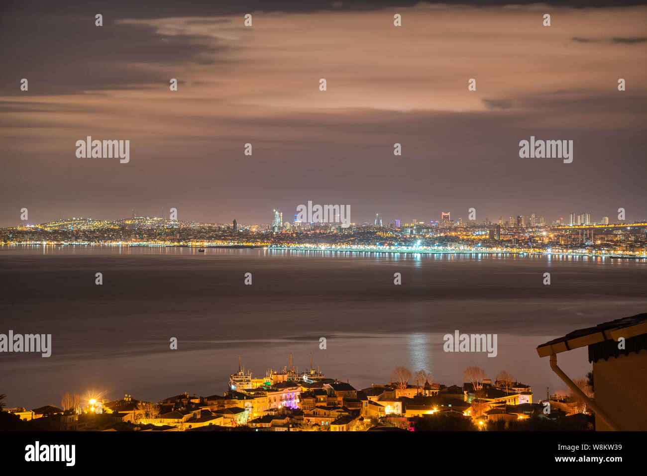 View at night of the Asian side of Istanbul across the Marmara sea from ...