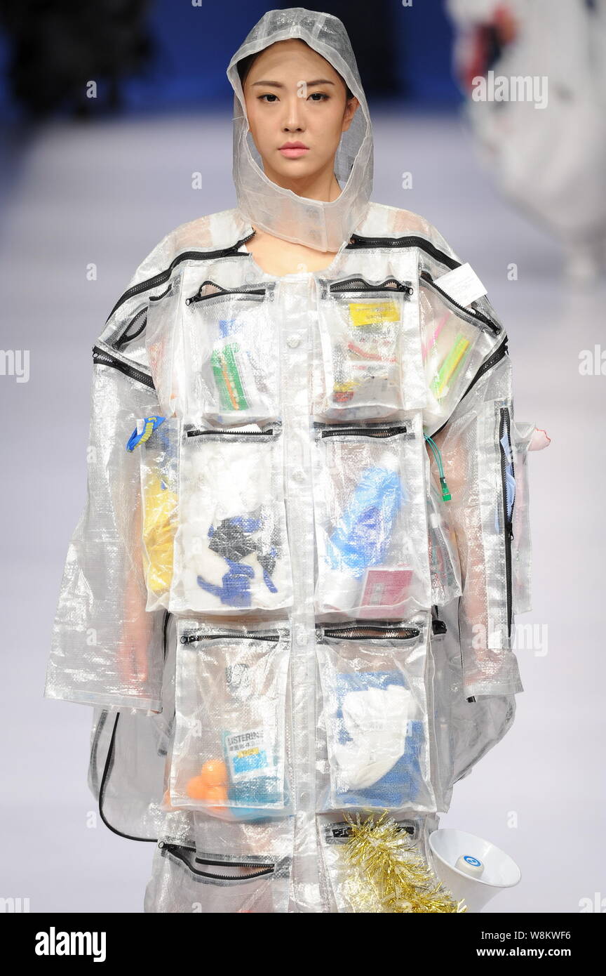 A model displays a new creation from the Beijing Institute of Fashion ...
