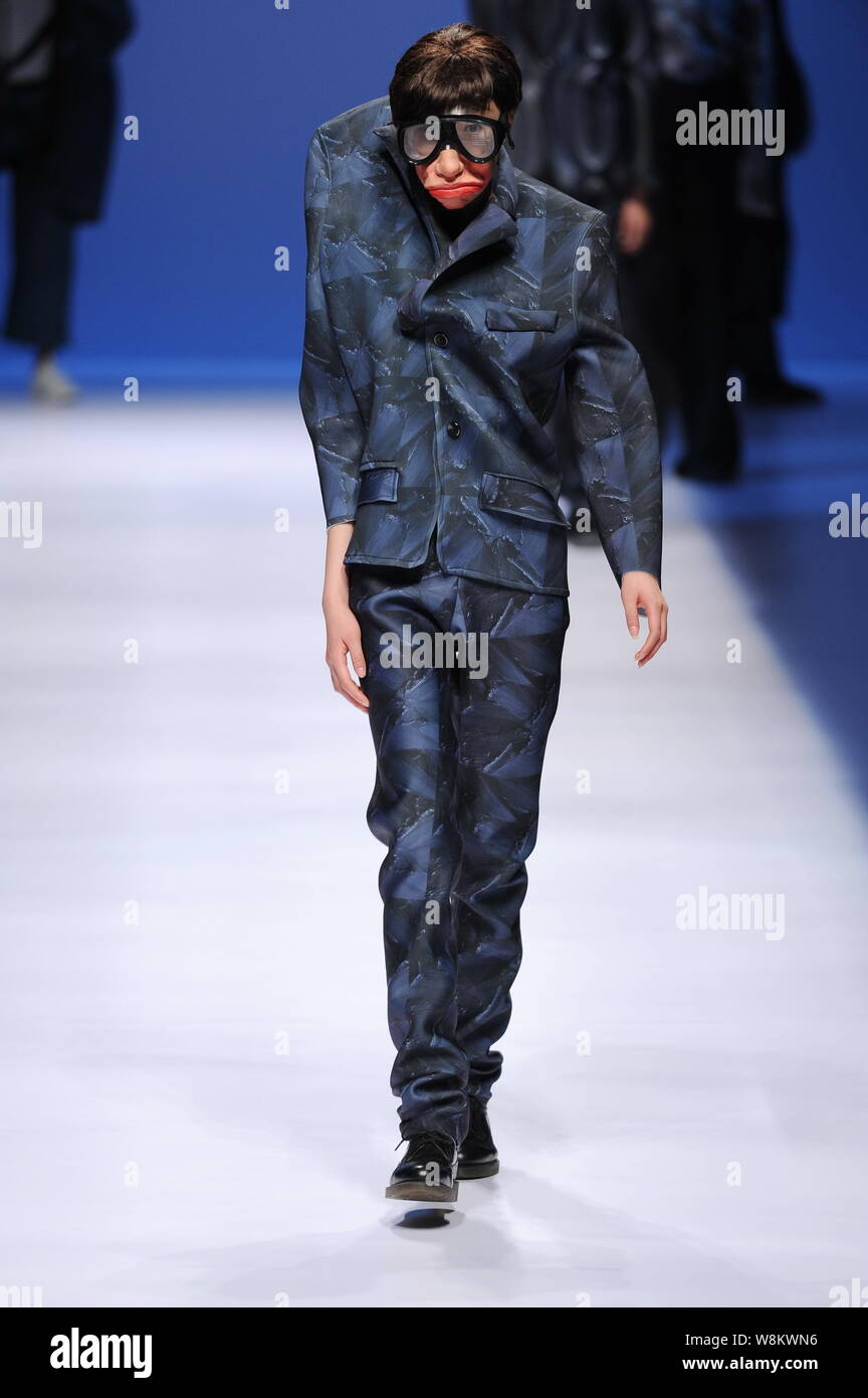 A model displays a new creation from the Beijing Institute of Fashion ...