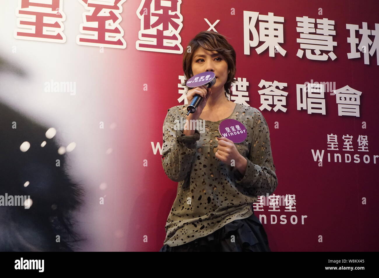 Hong Kong singer and actress Kelly Chen attends a signing event to ...