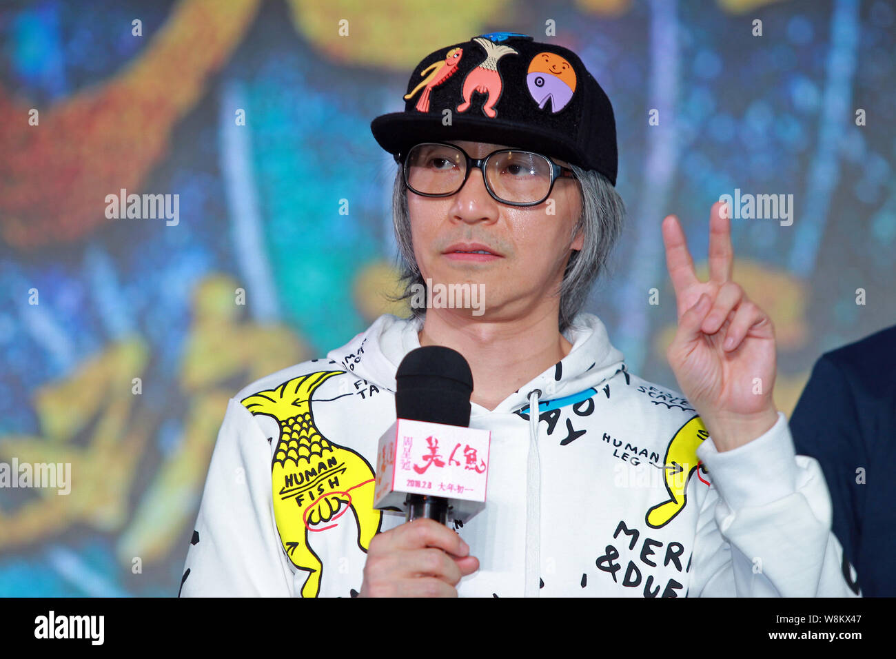 --FILE--Hong Kong actor and director Stephen Chow poses at a press ...