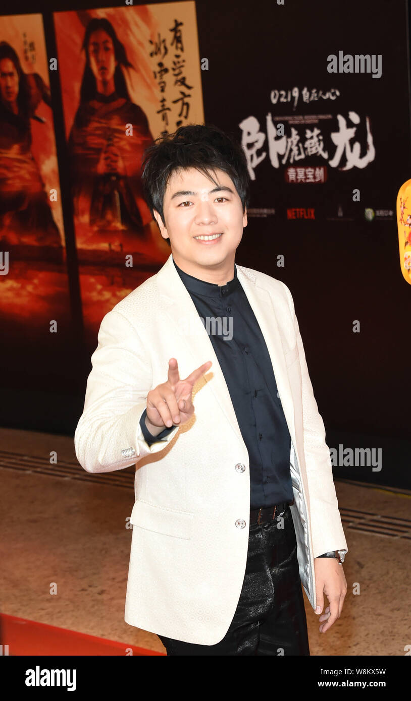 Chinese pianist Lang Lang arrives on the red carpet for the premiere of ...