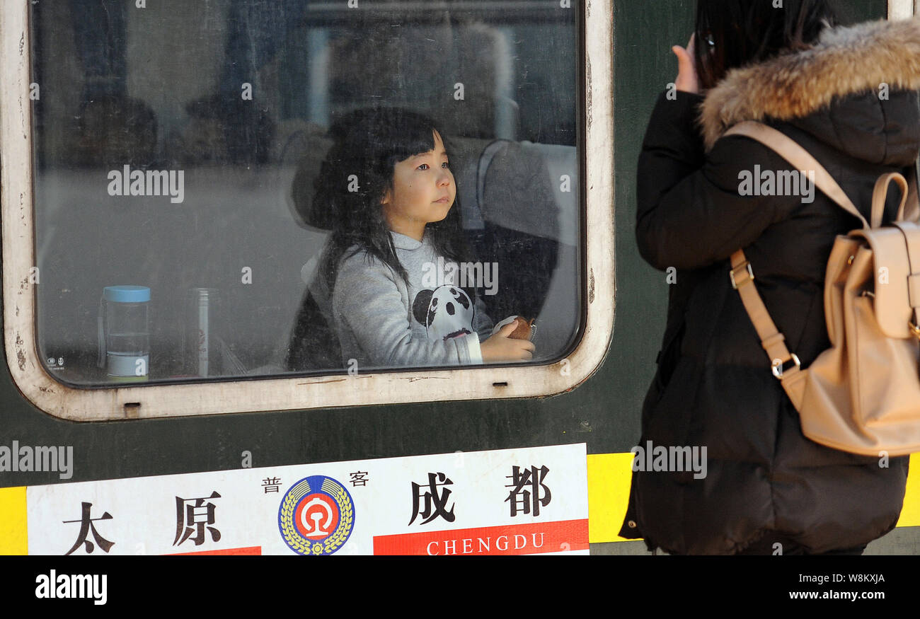 Five-year-old girl Fan Jingqi who is going back to her grandmother's ...