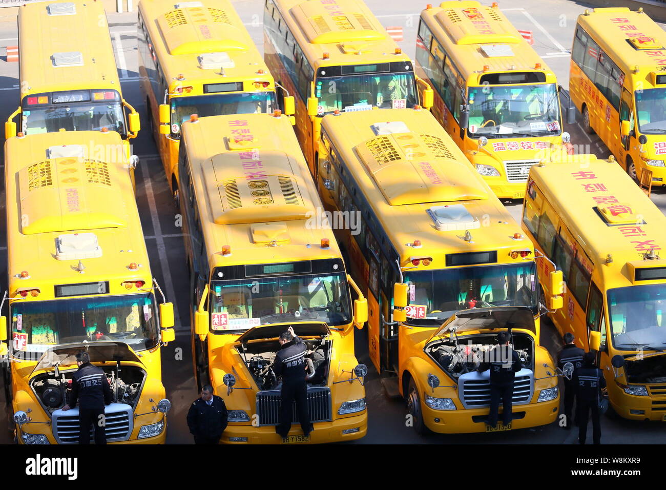 Chinese police officers check school buses in Qingdao city, east China ...