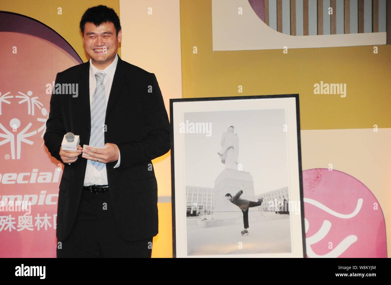 --FILE--Retired Chinese basketball superstar Yao Ming smiles during a ...