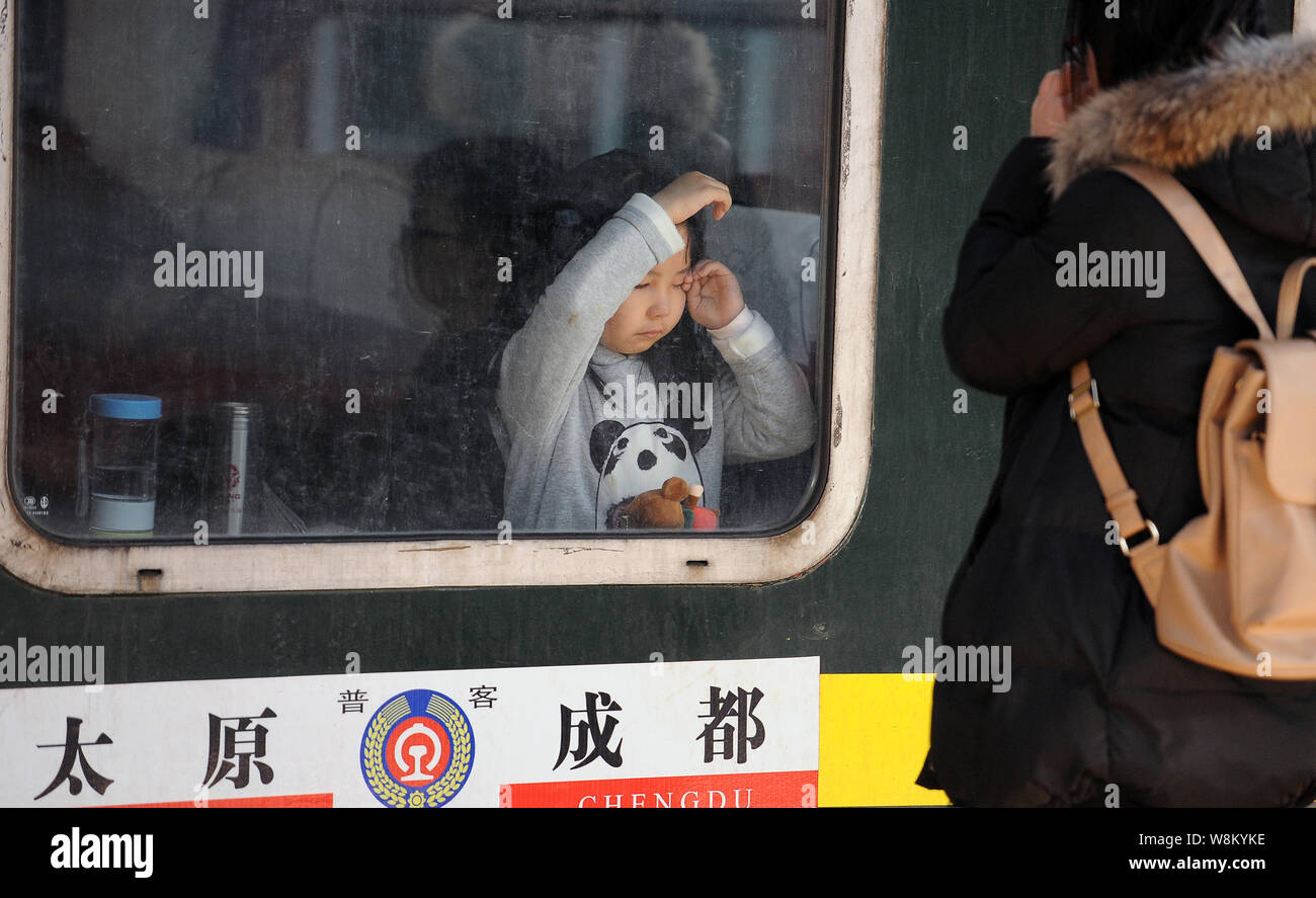Five-year-old girl Fan Jingqi who is going back to her grandmother's ...