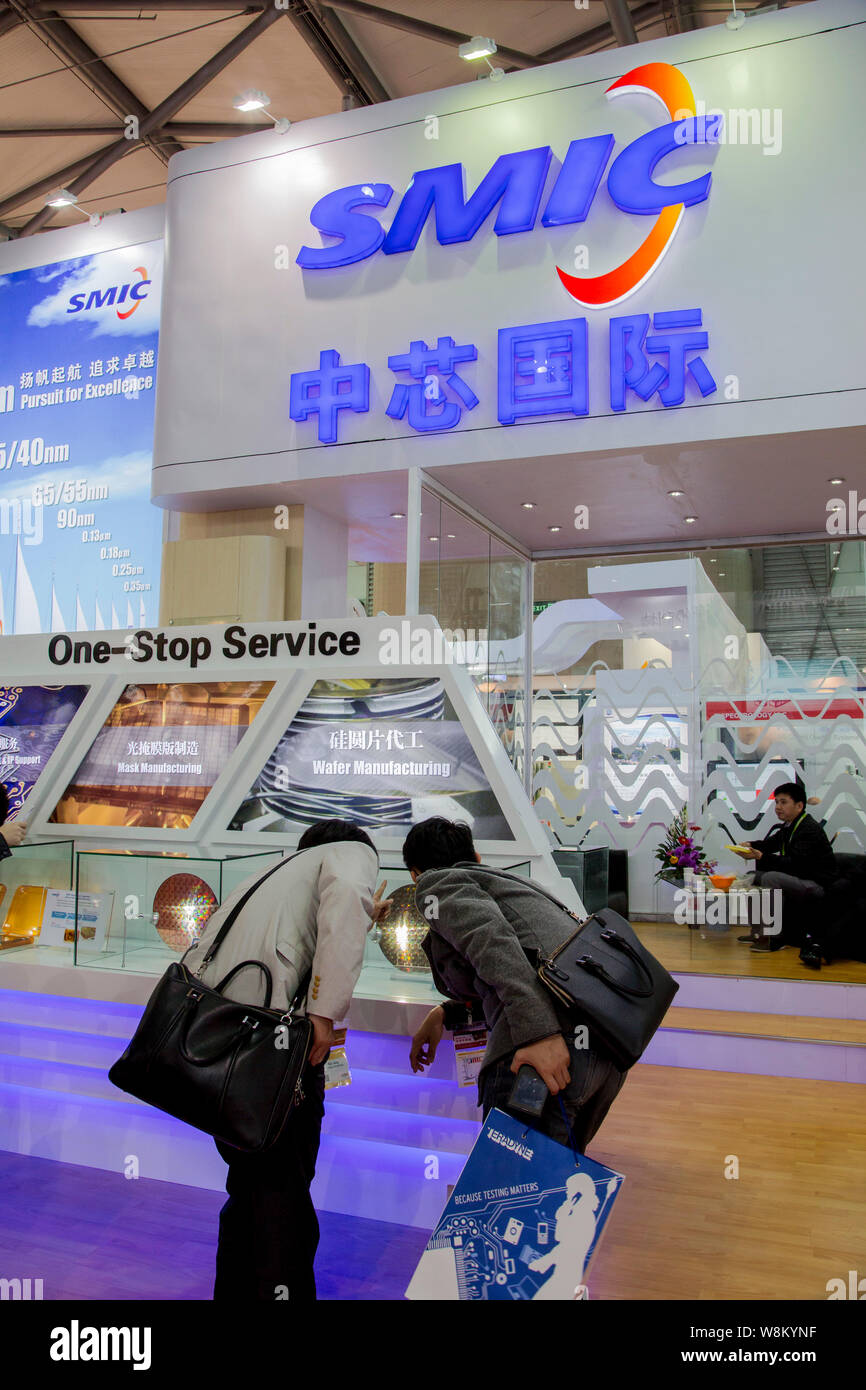 --FILE--People visit the stand of SMIC (Semiconductor Manufacturing ...