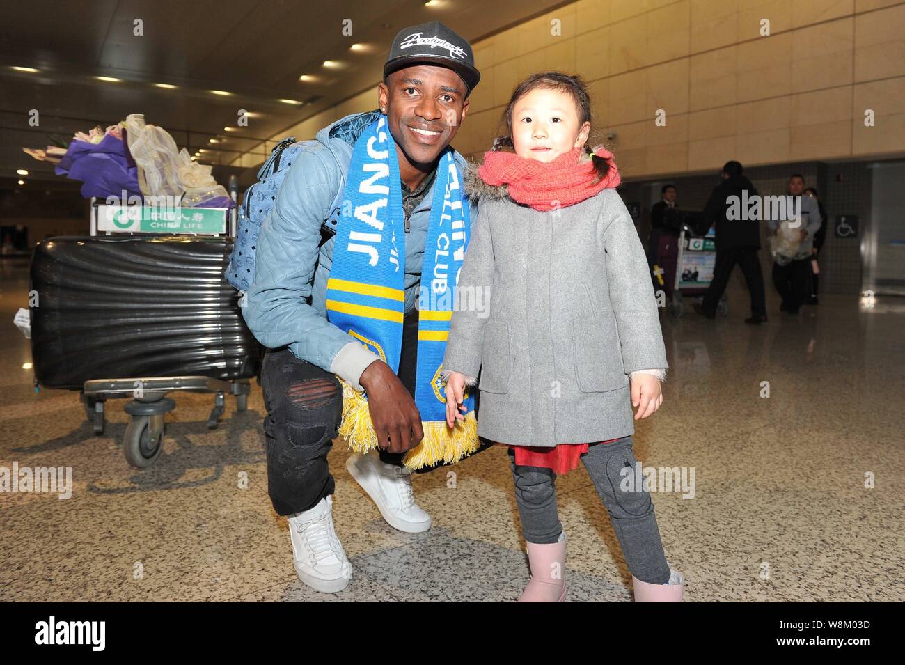 Brazilian footballer Ramires Santos do Nascimento, left, poses with a ...