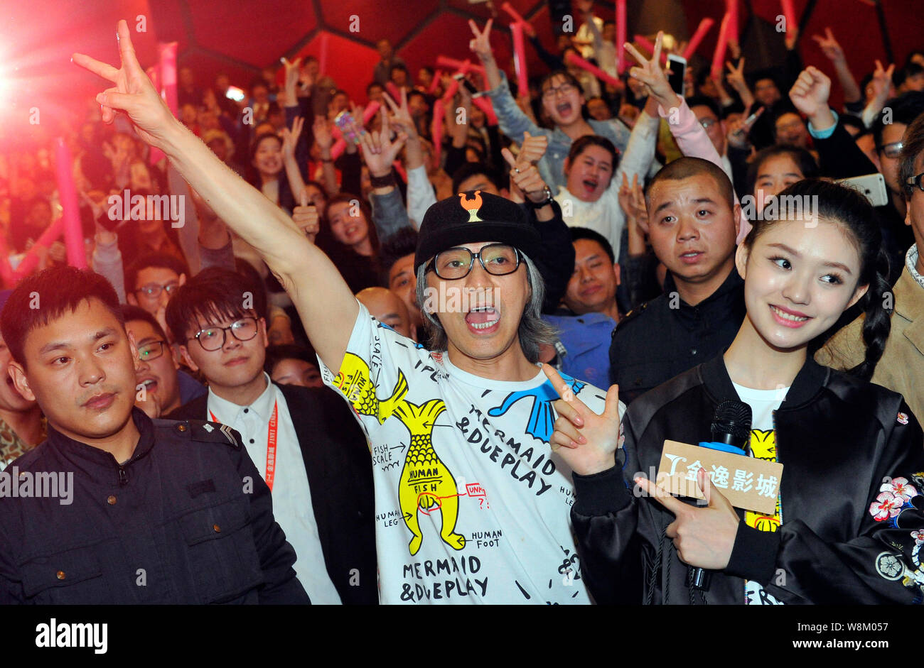 Hong Kong director Stephen Chow, center, and Chinese actress Lin Yun ...