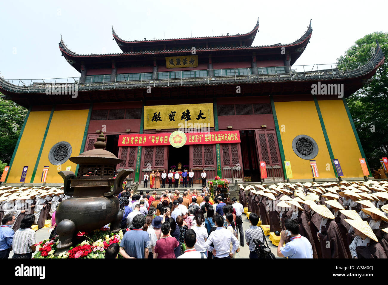 --FILE--Chinese Buddhist monks stand in front of Lingyin Temple in ...
