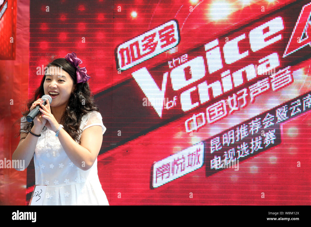 --FILE--A Chinese participant performs during a regional tryout for ...