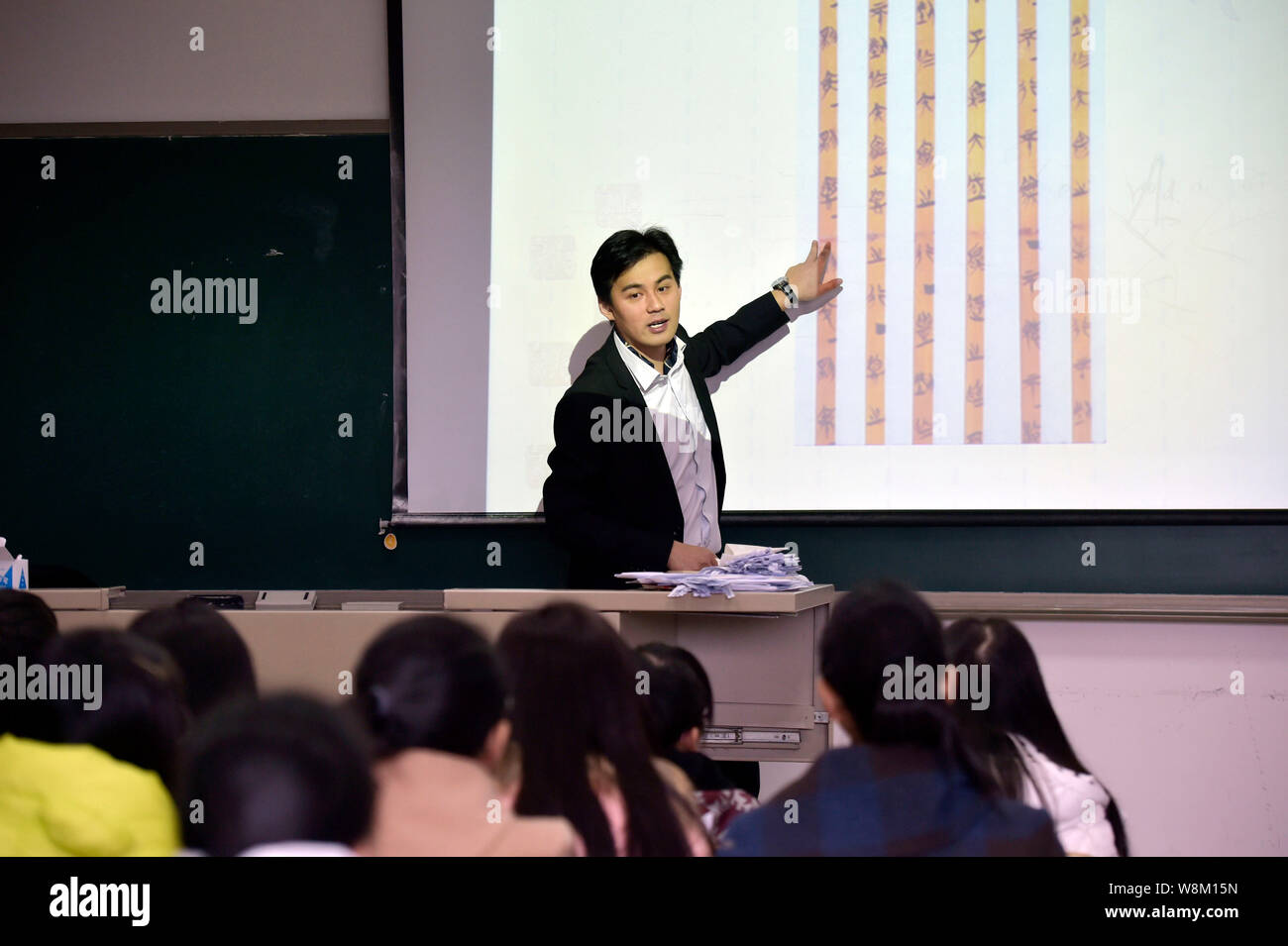 --FILE--A young male Chinese teacher gives a history lesson to his ...