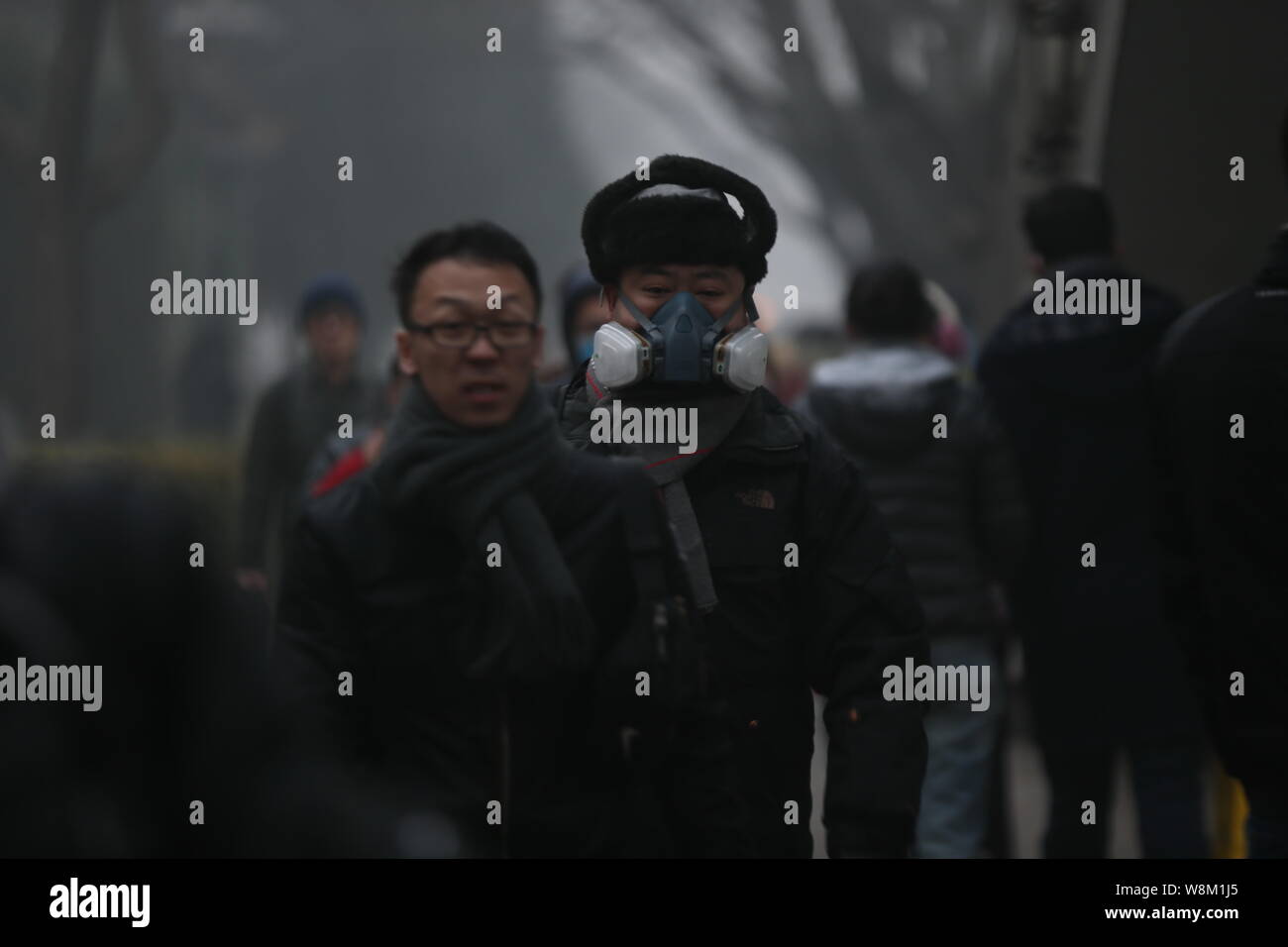 Beijing street smog masks hi-res stock photography and images - Alamy
