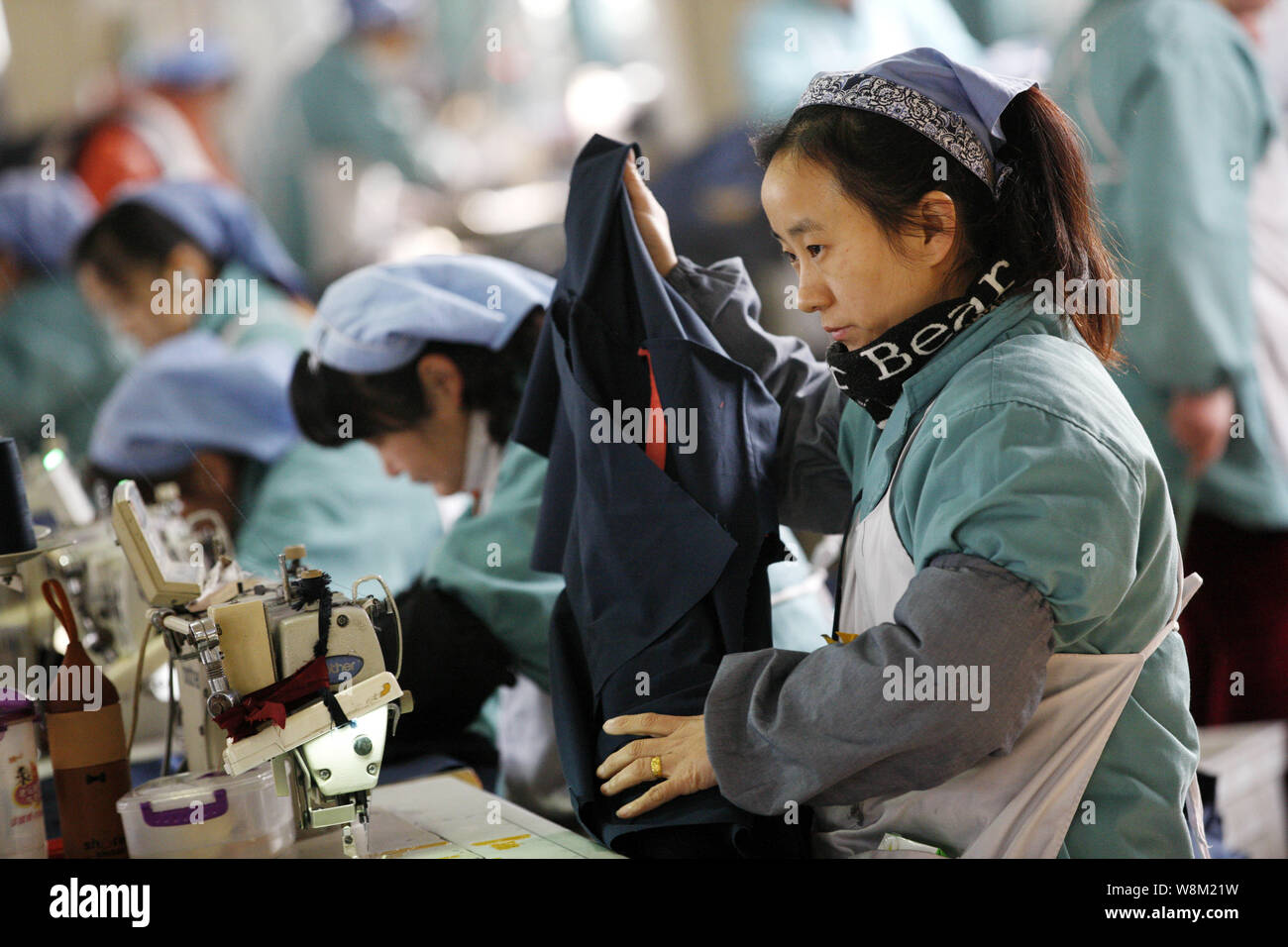 Asian workers in a factory hi-res stock photography and images - Alamy