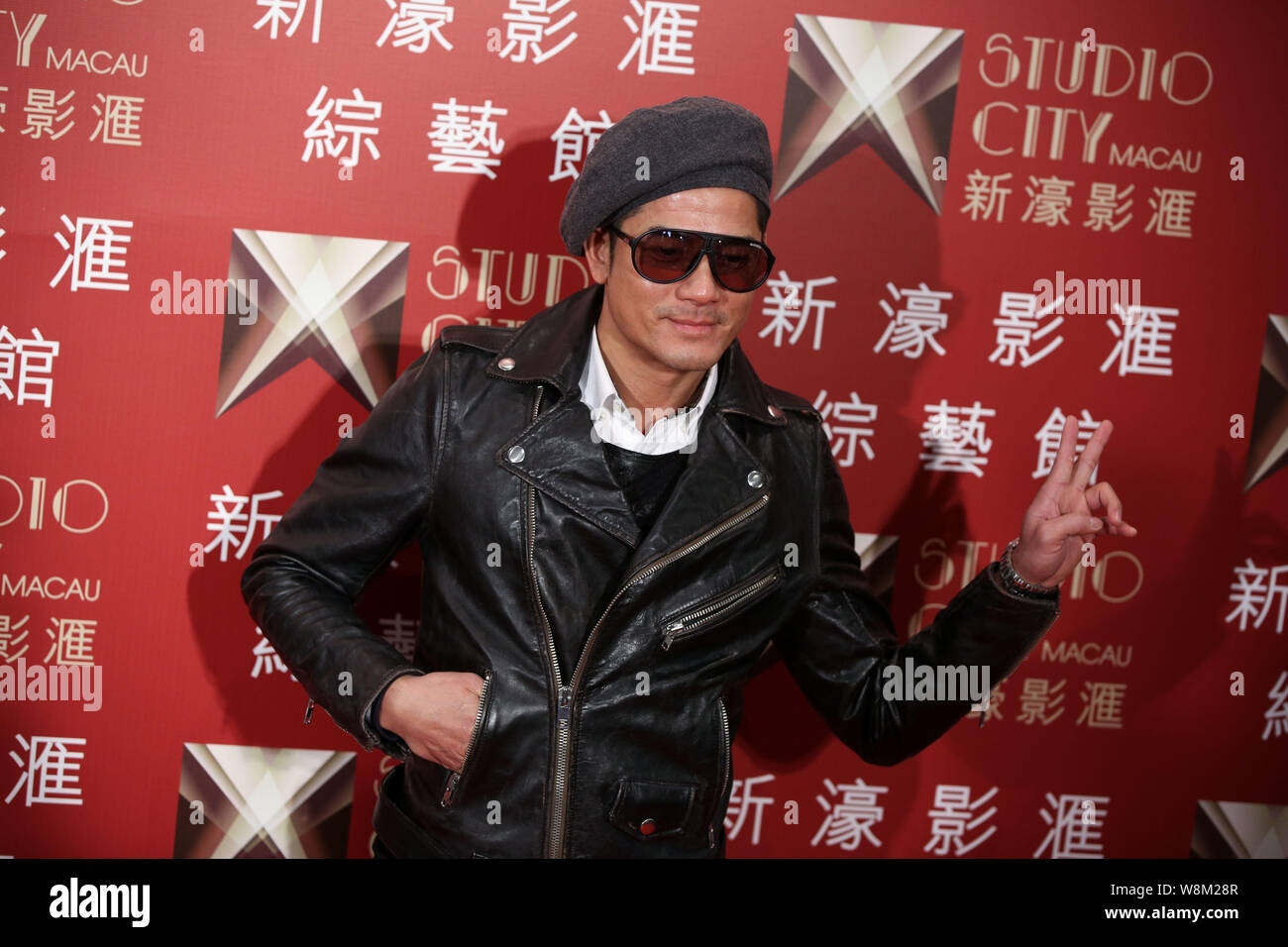 Hong Kong actor and singer Aaron Kowk poses as he arrives at a concert ...