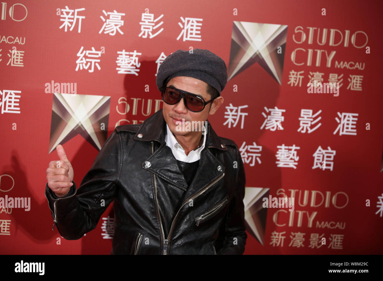 Hong Kong actor and singer Aaron Kowk poses as he arrives at a concert ...