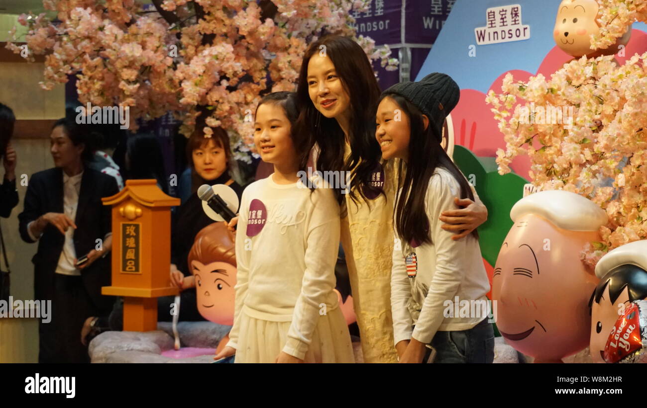 South Korean actress Cheon Seong-im, center, better known by her stage ...