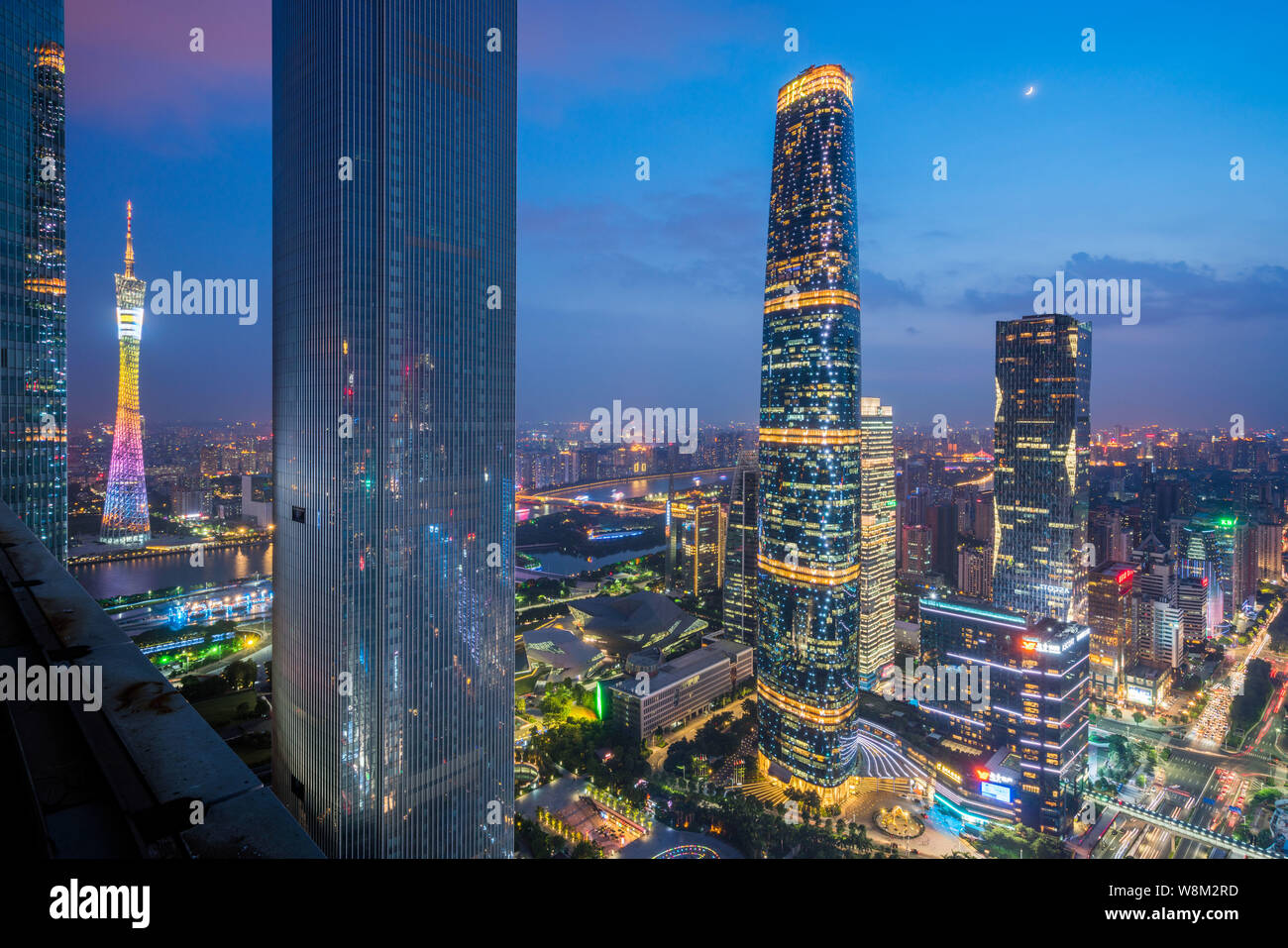--FILE--Night view of the Canton Tower, left, and other skyscrapers and ...