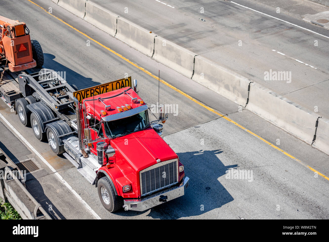 Red big rig American bonnet semi truck with high exhaust pipes and ...