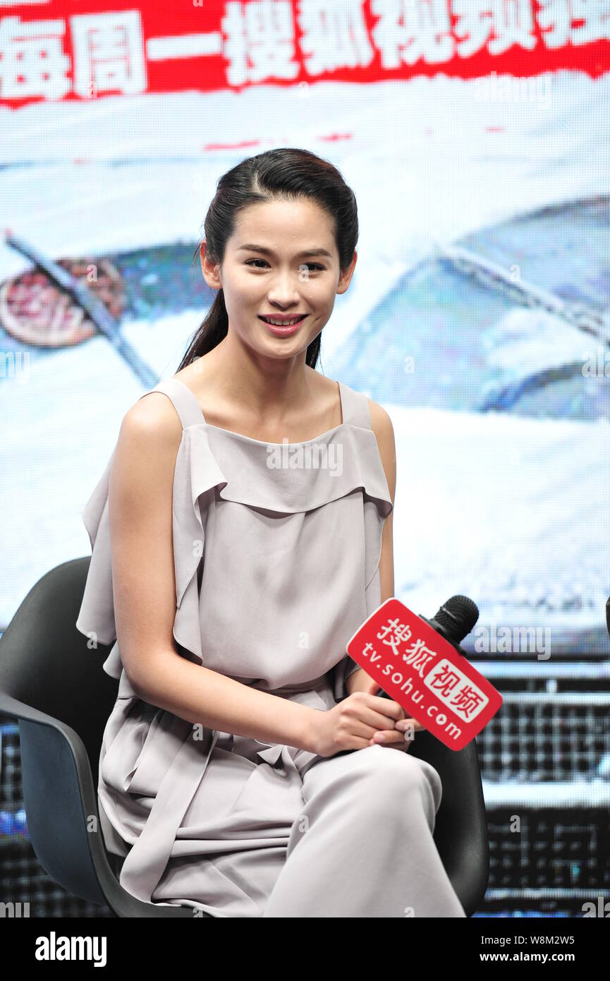 Chinese actress Qu Jingjing reacts at a press conference for the ...