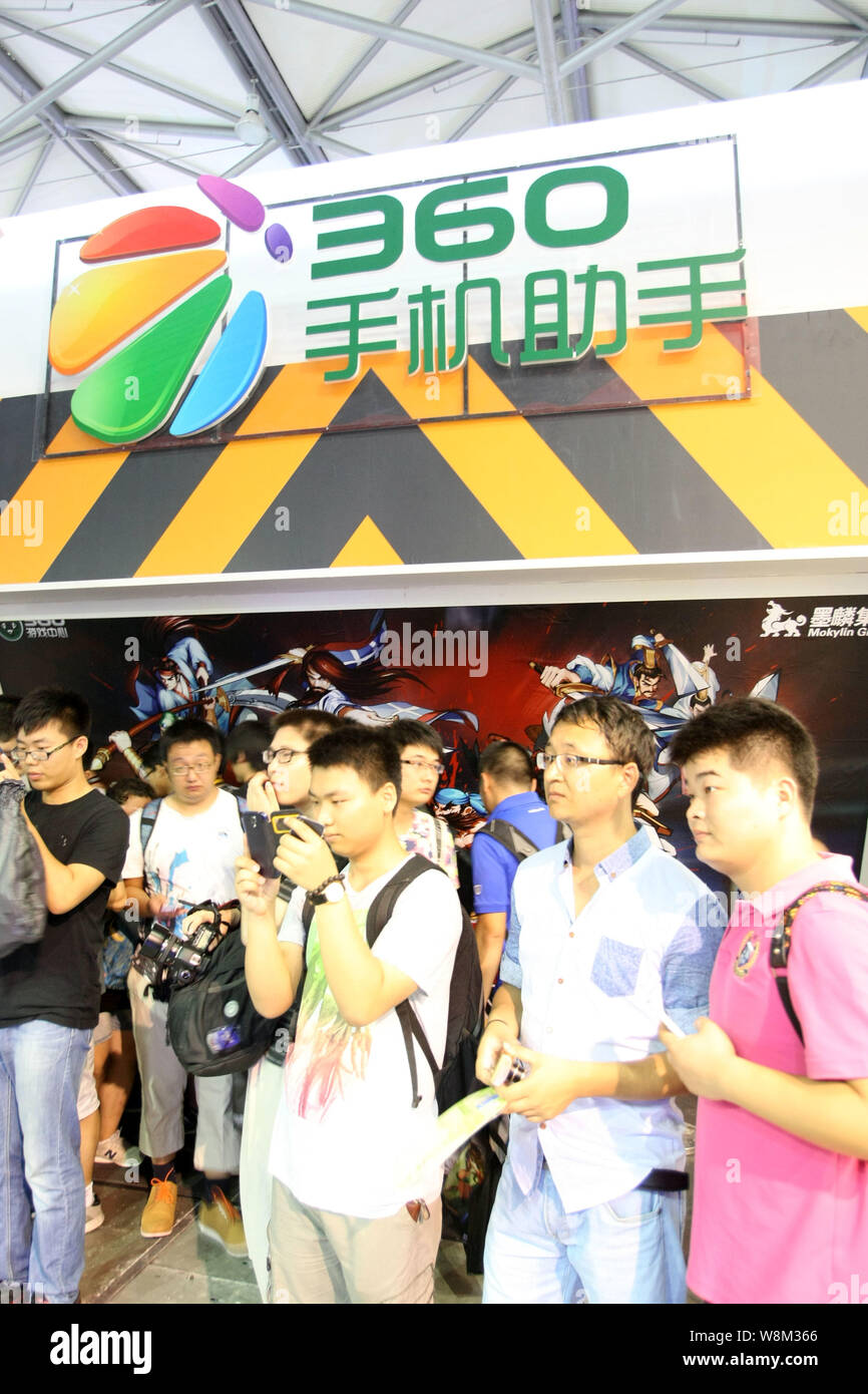 --FILE--People visit the stand of 360 Mobile Assistant of Qihoo 360 ...