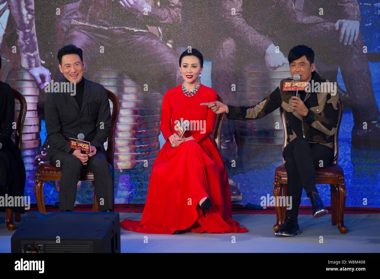 (From left) Hong Kong singer and actor Jacky Cheung, actress Carina Lau ...