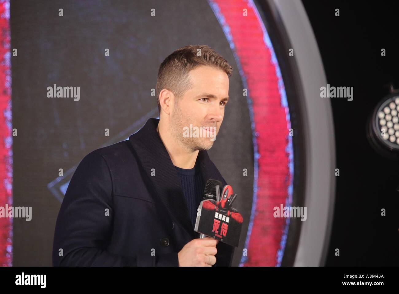 Canadian actor Ryan Reynolds poses during a press conference for his ...