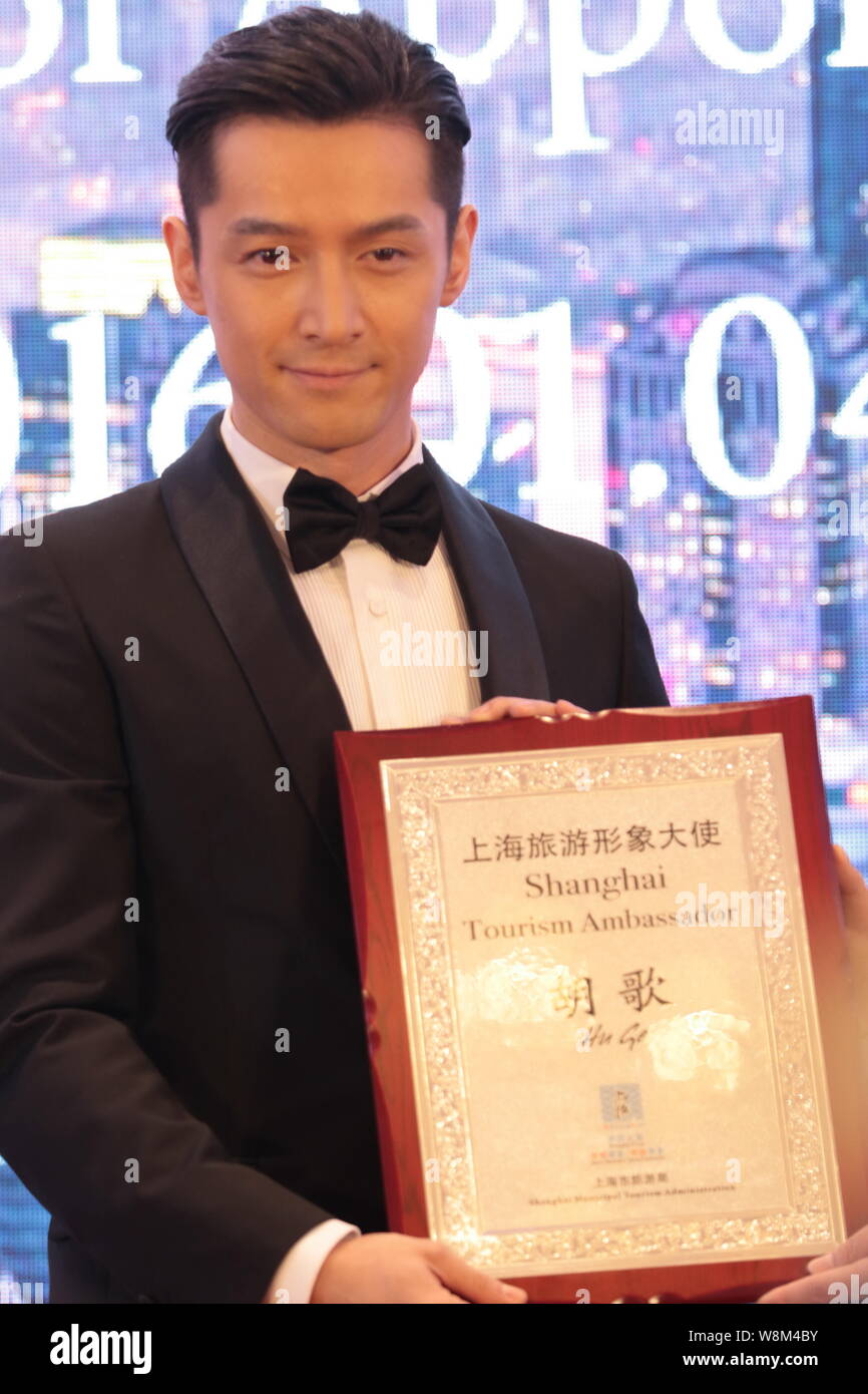 Chinese singer and actor Hu Ge holds certificate of Shanghai Tourism ...