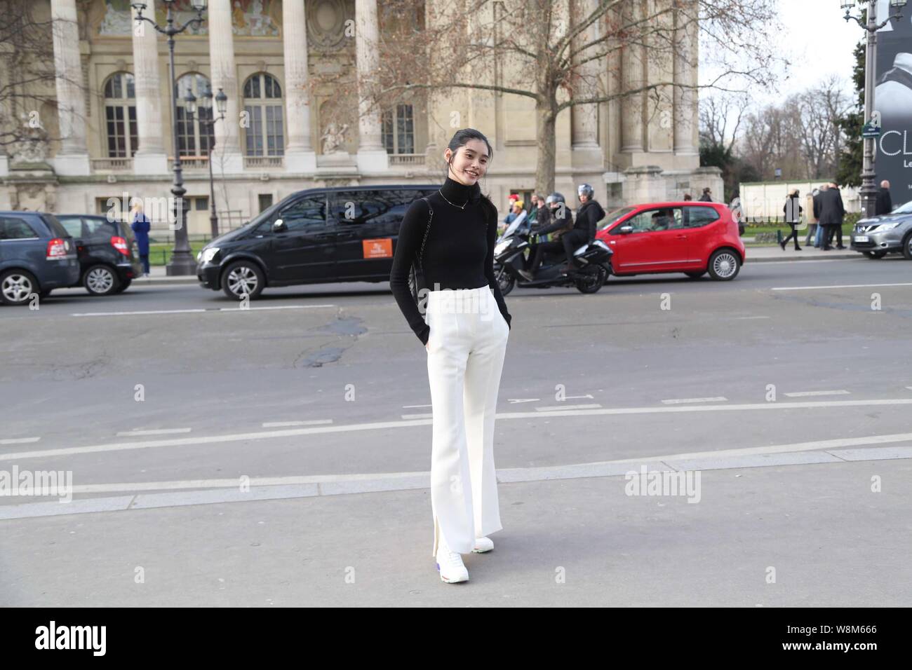 Chinese model Xi Mengyao poses for street snap after the Chanel fashion ...