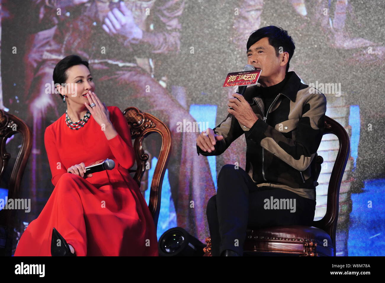 Hong Kong actress Carina Lau, left, and actor Chow Yun-fat attend a press conference to promote ...