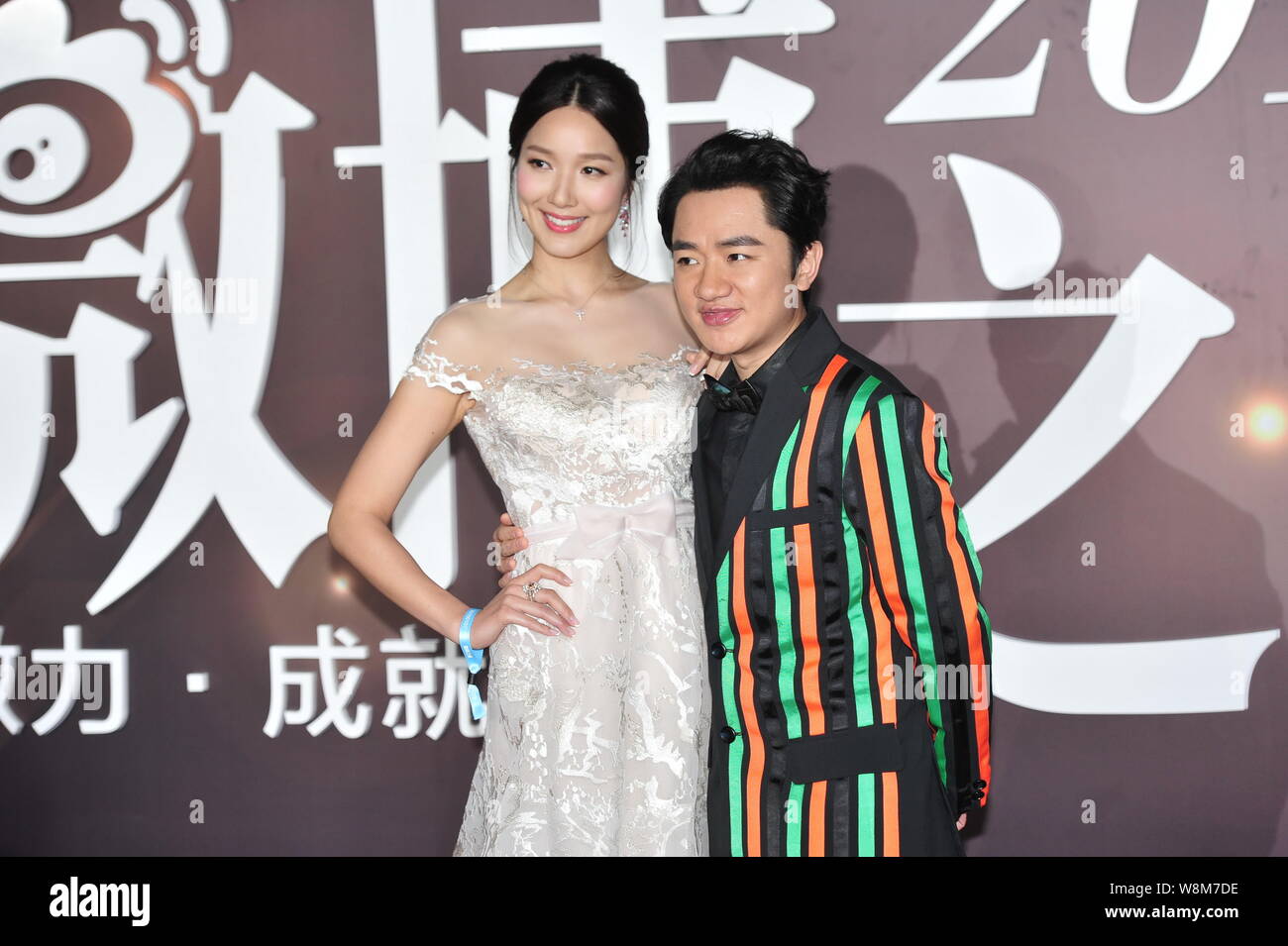 Hong Kong actress Leanne Li and her actor husband Wong Cho-lam arrive ...