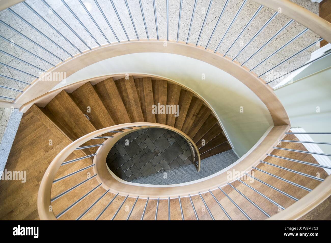 Overhead shot of a modern house wooden spiral staircase Stock Photo - Alamy